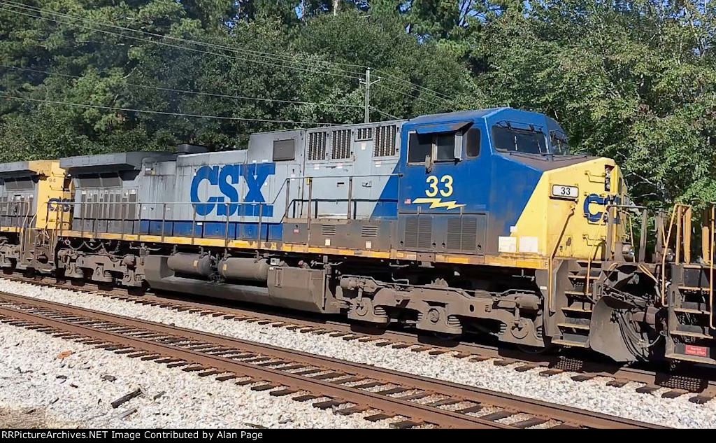 CSX AC44CW 33 runs second in a set of 5 units rolling mixed freight SB